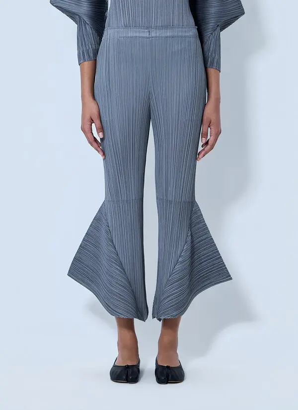 Issey Miyake Mid Rise Flared Pleated Trousers