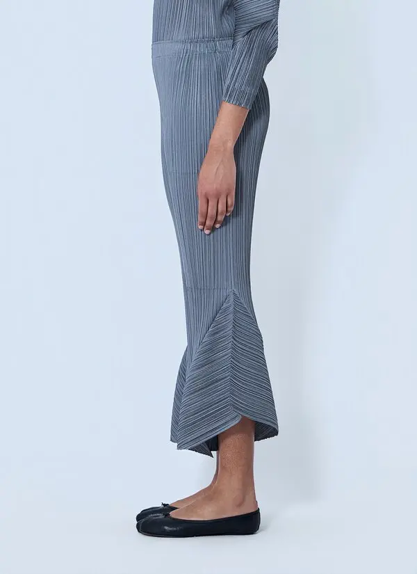Issey Miyake Mid Rise Flared Pleated Trousers