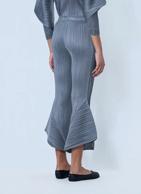 Issey Miyake Mid Rise Flared Pleated Trousers