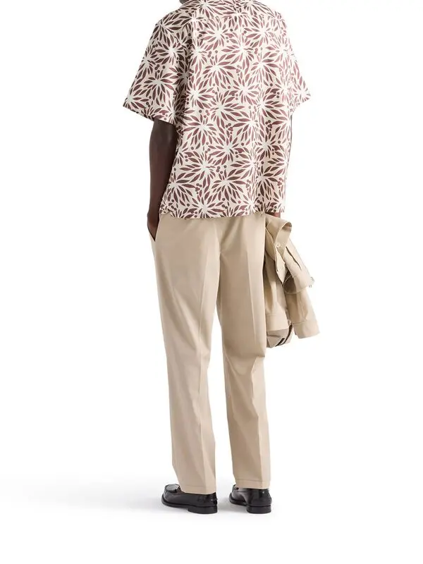 Prada Cotton Trousers With Enameled Metal Triangle Logo