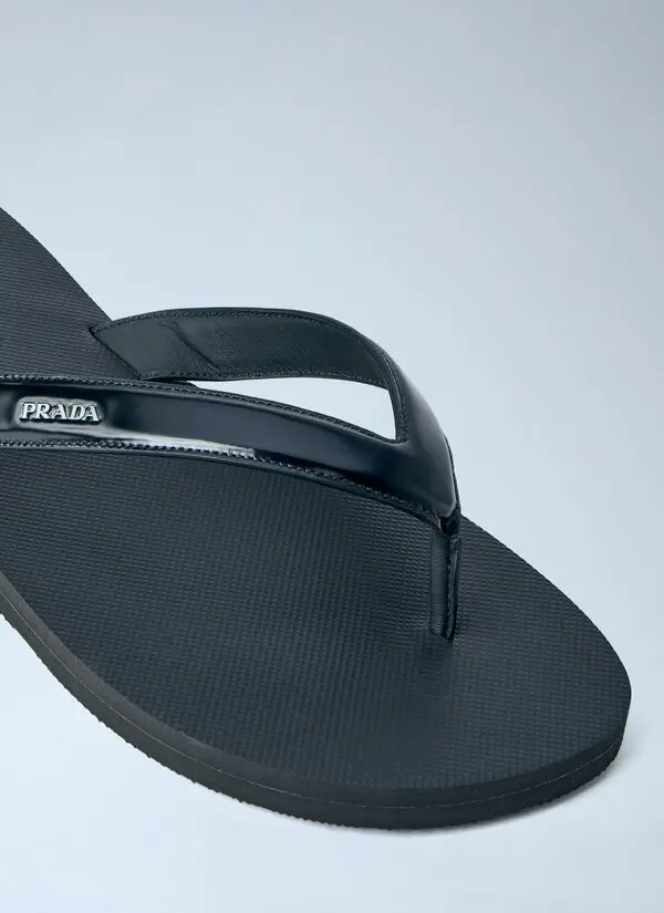 Prada Embossed Logo Leather Flip-flop Sandals