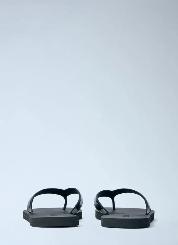 Prada Embossed Logo Leather Flip-flop Sandals