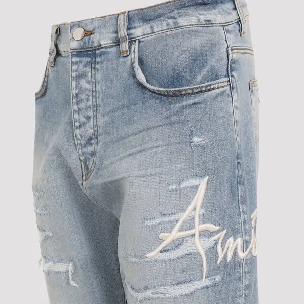 Amiri Repaired Slim Jeans