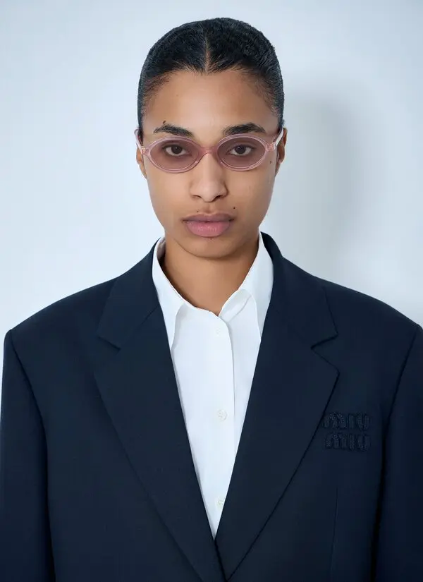 Miu Miu Oval Frame Sunglasses