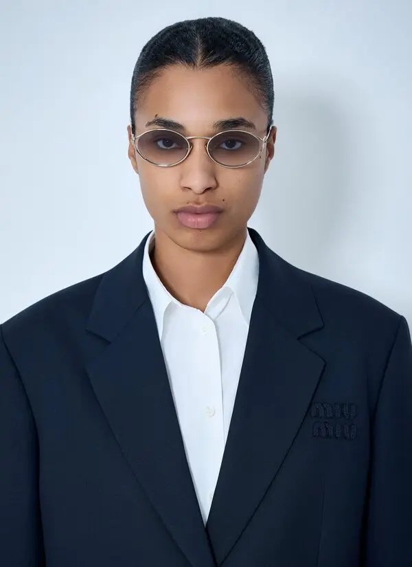 Miu Miu Oval Sunglasses With Metal Frames