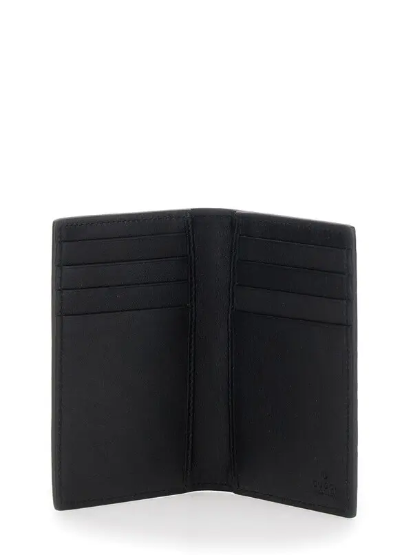 Gucci Black Gg Vertical Bi-fold Wallet In Hammered Leather