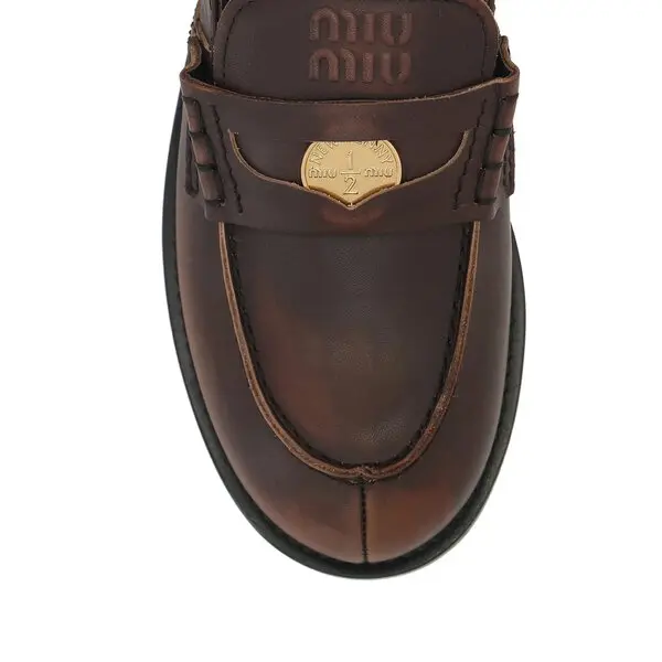 Miu Miu Embossed Logo Detail Loafers - Brown