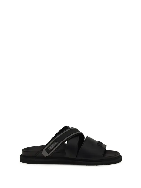 Moschino Flat Leather Sandals With Embossed Logo - Black