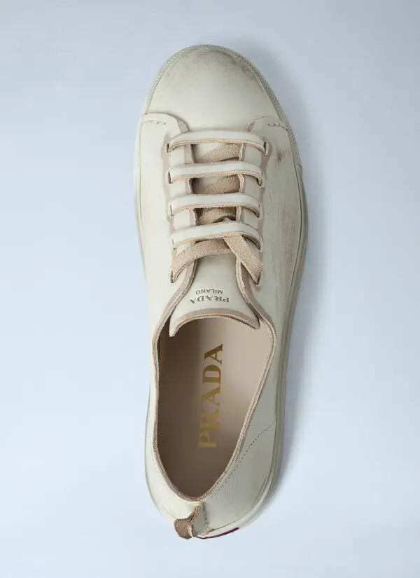 Prada Distressed Leather Lace-up Sneakers