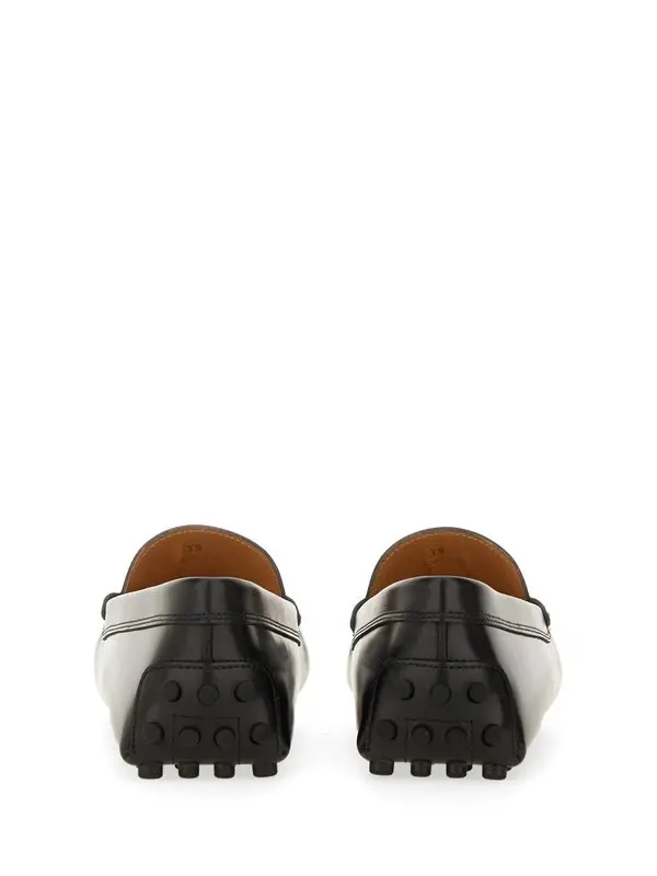 TOD'S Calfskin Moccasins With Gold Tone Bar Detail - Black