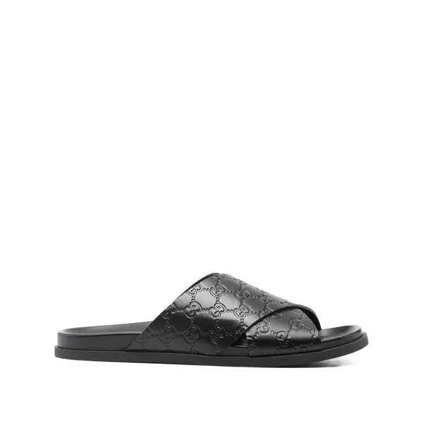 Gucci Interlocking G Embossed Leather Criss-cross Strap Flat Sandals