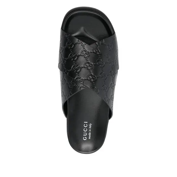Gucci Interlocking G Embossed Leather Criss-cross Strap Flat Sandals