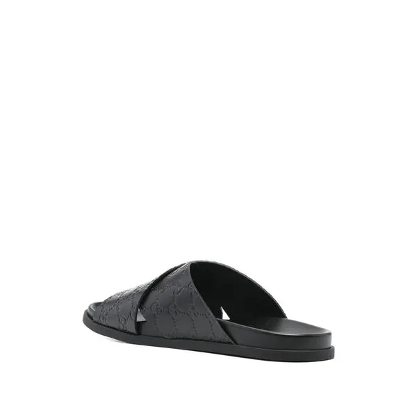 Gucci Interlocking G Embossed Leather Criss-cross Strap Flat Sandals