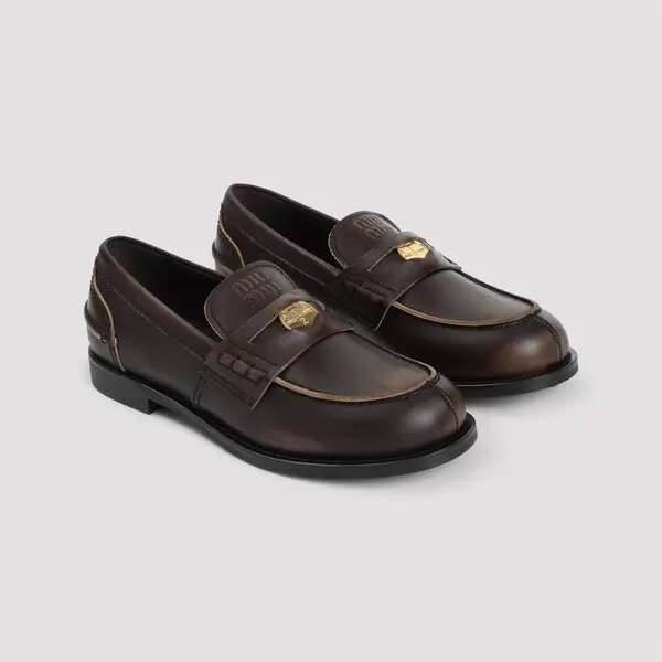 Miu Miu Leather Loafers With Metal Ornament - Brown