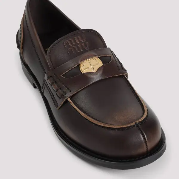 Miu Miu Leather Loafers With Metal Ornament - Brown