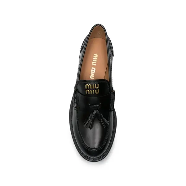 Miu Miu Embossed Logo Leather Loafers - Black