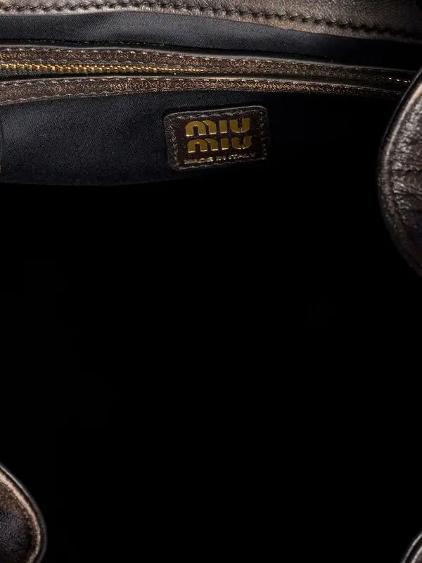 Miu Miu Distressed Leather Backpack