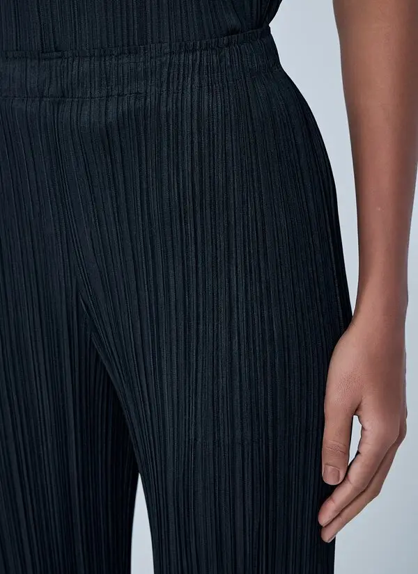 Issey Miyake Mid Rise Wide-leg Textured Weave Pleated Pants - Black