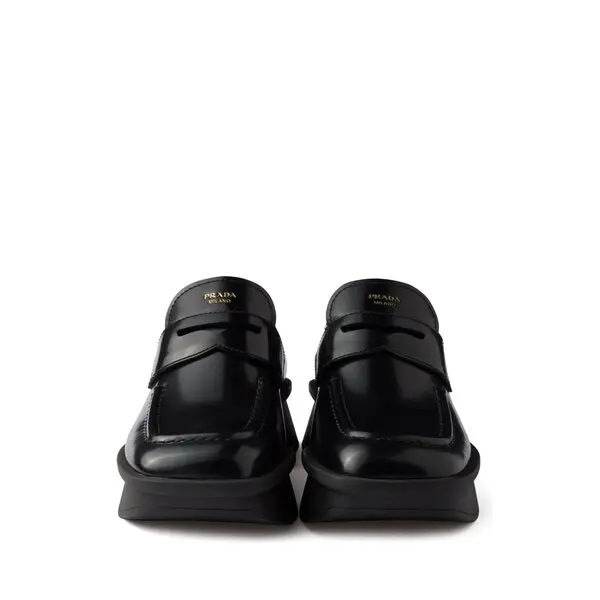 Prada Patent Leather Slip-on Loafers With Embossed Logo - Black
