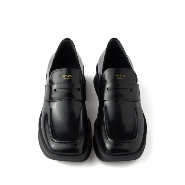 Prada Patent Leather Slip-on Loafers With Embossed Logo - Black