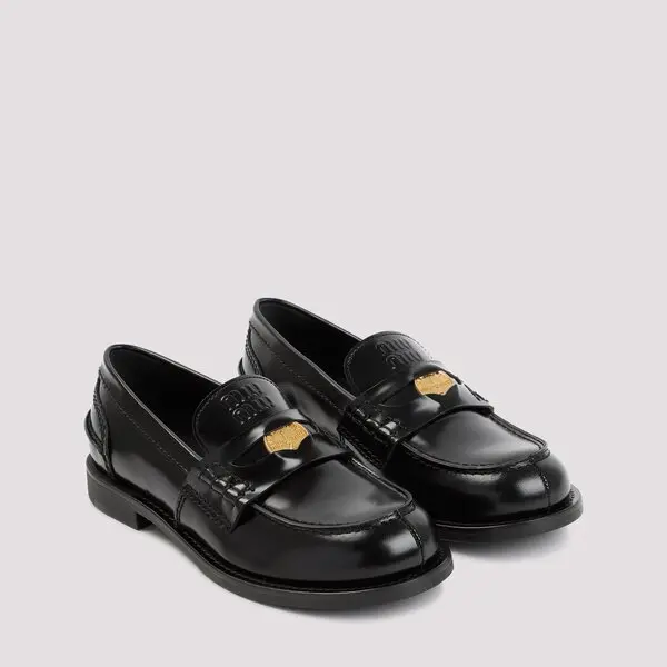 Miu Miu Leather Loafers With Metal Plaque - Black