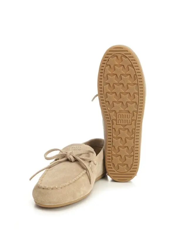 Miu Miu Suede Moc Toe Loafers With Bow Detailing