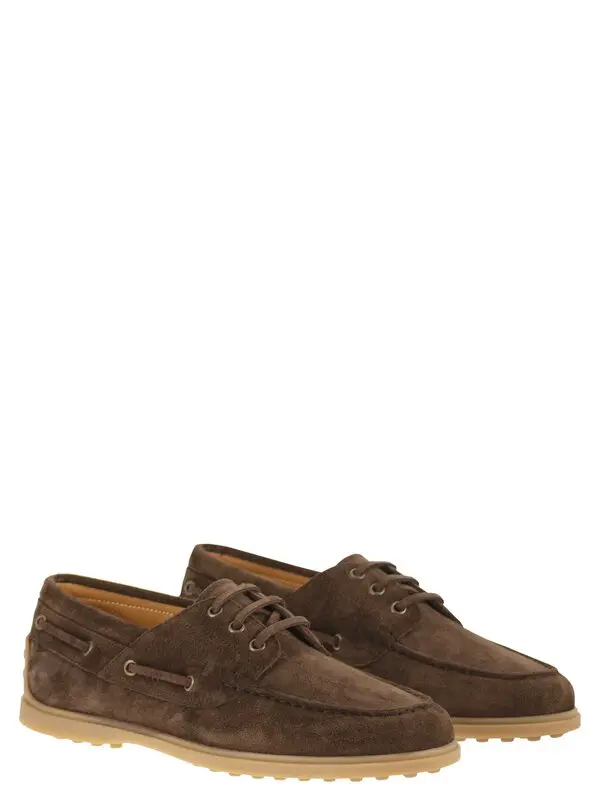 TOD'S Suede Calfskin Boat Shoe With Embossed Monogram - Brown