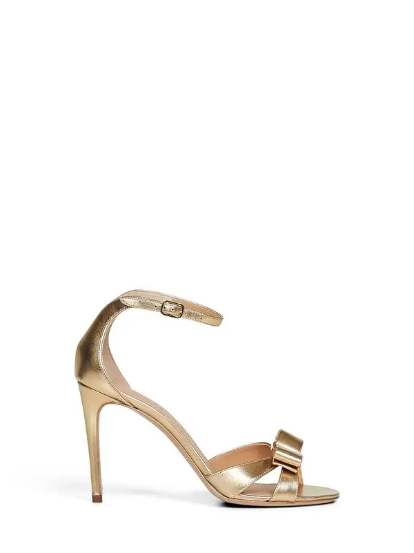 FERRAGAMO Gold Laminated Nappa Leather Roxy Vara Bow Sandals - Multicolor