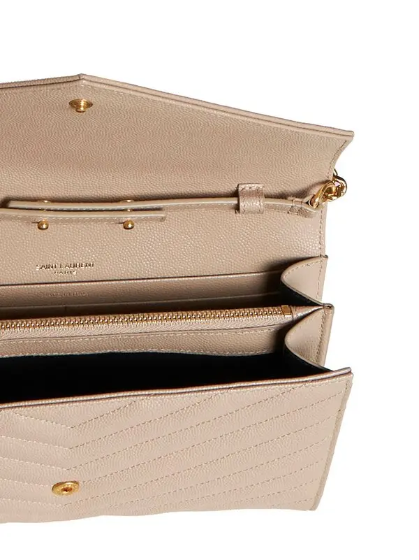Saint Laurent Quilted Leather Clutch With Monogram