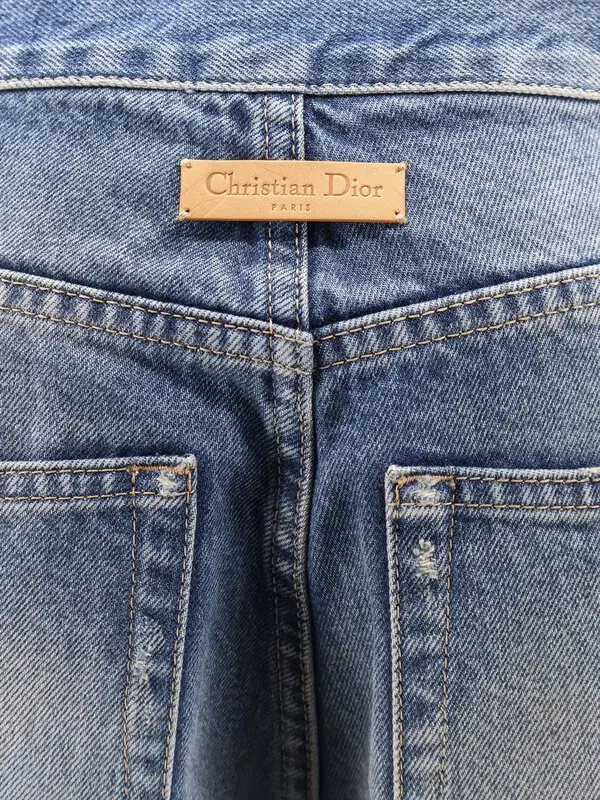 Dior Flared Jeans With Distressed Effect