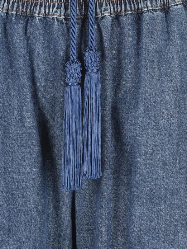 Valentino Garavani Wide-leg Jeans With Tassel Detail - Blue