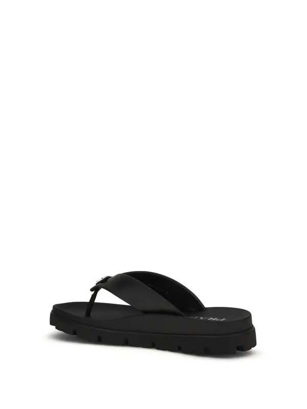 Prada Leather Flip-flop Sandals With Metal Triangle Logo
