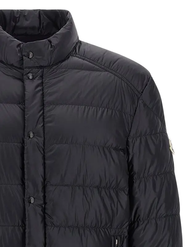 Moncler Quilted Down Jacket With High Neck And Logo Patch - Blue