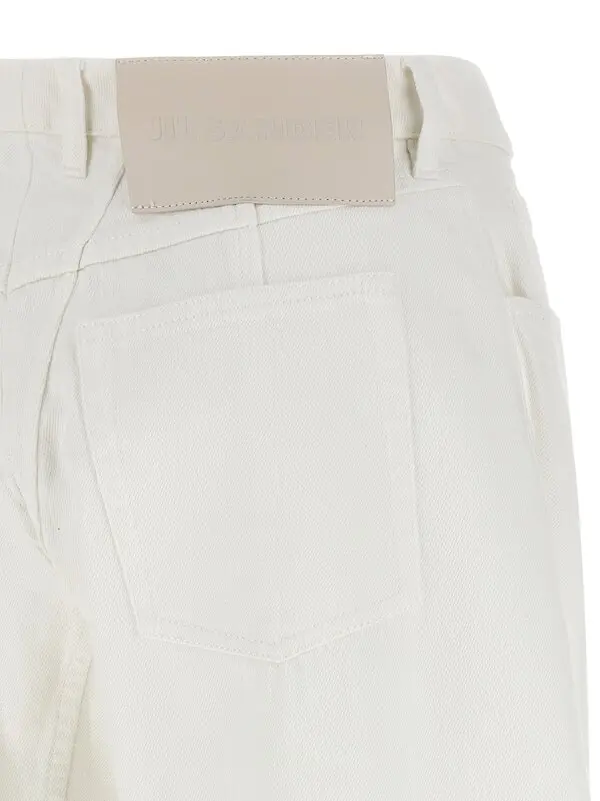 JIL SANDER High-waisted Cotton Denim Jeans With Raw Cut Hem - White
