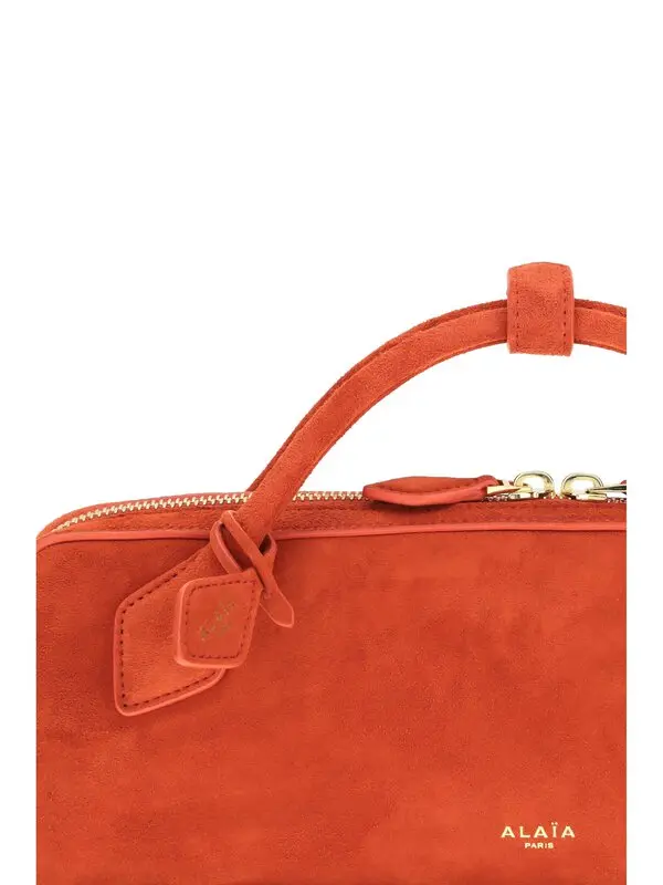 Alaïa Le Teckel Suede Clutch Bag - Red