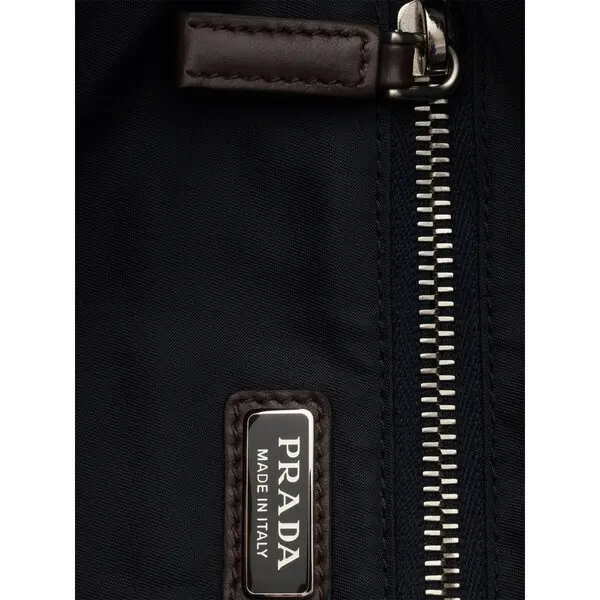 Prada Leather Trimmed Enamel Triangle Logo Wash Bag