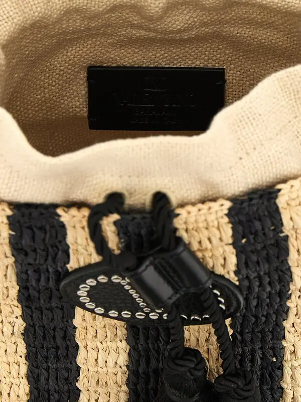 Valentino Garavani Small Raffia Bucket Bag With Studded Vlogo Signature - Black