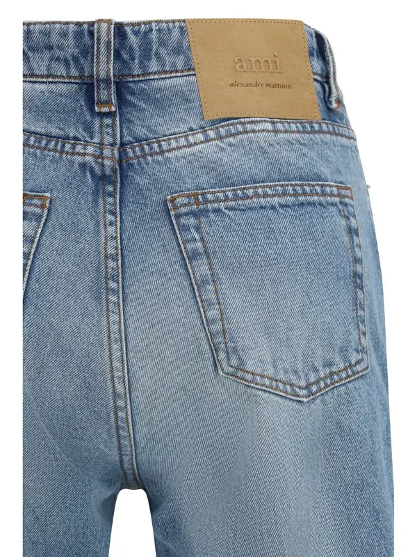 Ami Flared Jeans In Washed Denim