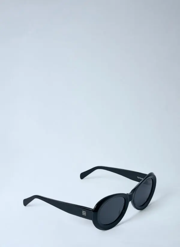 TOTEME Oval Sunglasses With Silver-tone Monogram - Black