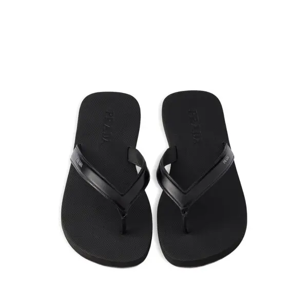 Prada Embossed Logo Leather Flip Flops - Black