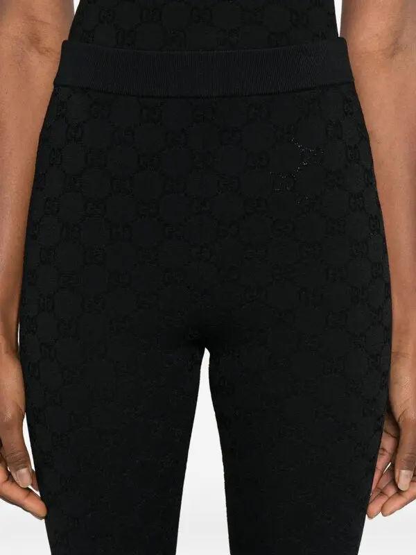 Gucci Skinny Fit Trousers With Allover Logo