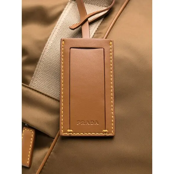 Prada Panelled Leather Trimmed Luggage & Holdalls