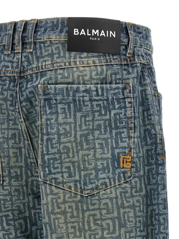 Balmain Monogram Print Faded Effect Jeans