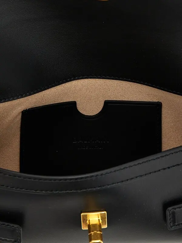 Balmain B-buzz 23 Leather Clutch Bag With Logo Closure - Black
