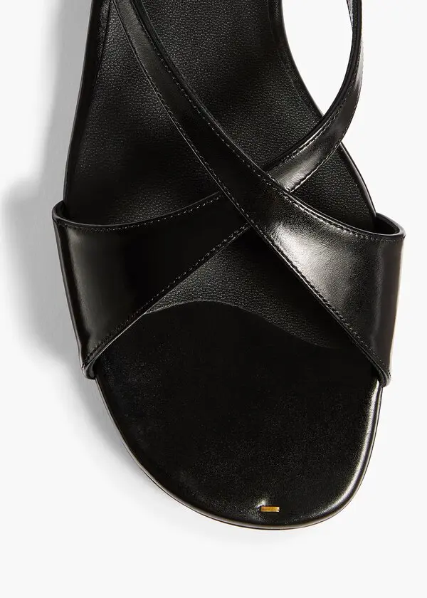 Khaite Liria Glazed Leather Ankle Strap Flat Sandals