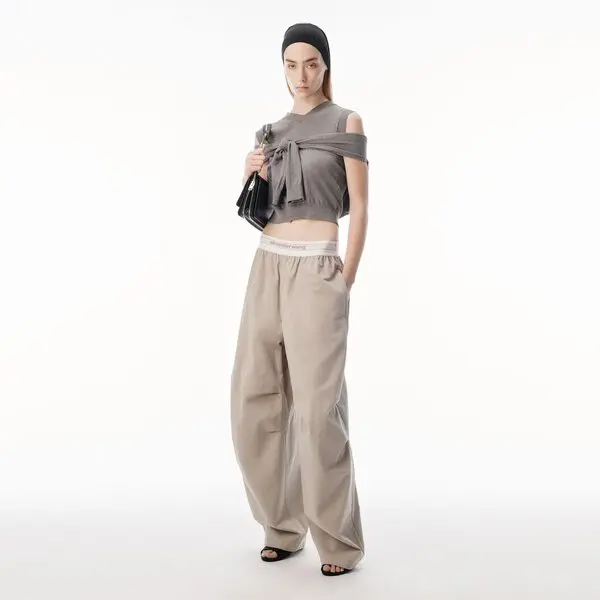 Alexander Wang Mid-rise Pleated Wide-leg Pants With Logo Elastic Waist - Stone