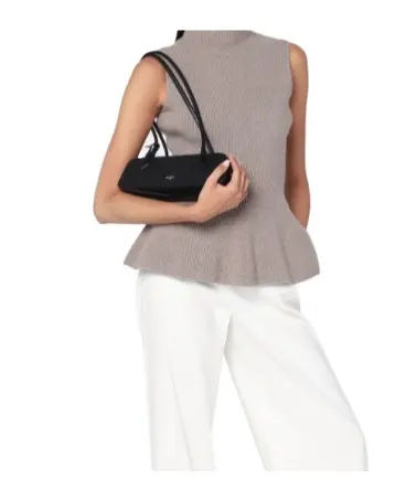 RÓHE Sleeveless Ribbed Turtleneck Sweater With Ruffled Hem