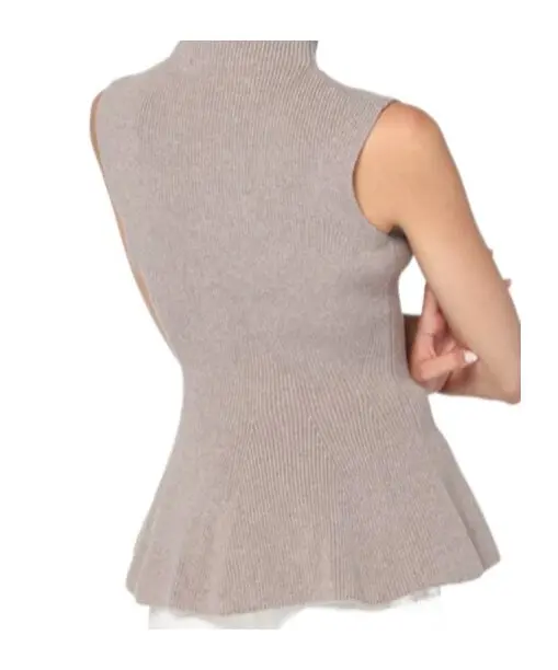 RÓHE Sleeveless Ribbed Turtleneck Sweater With Ruffled Hem