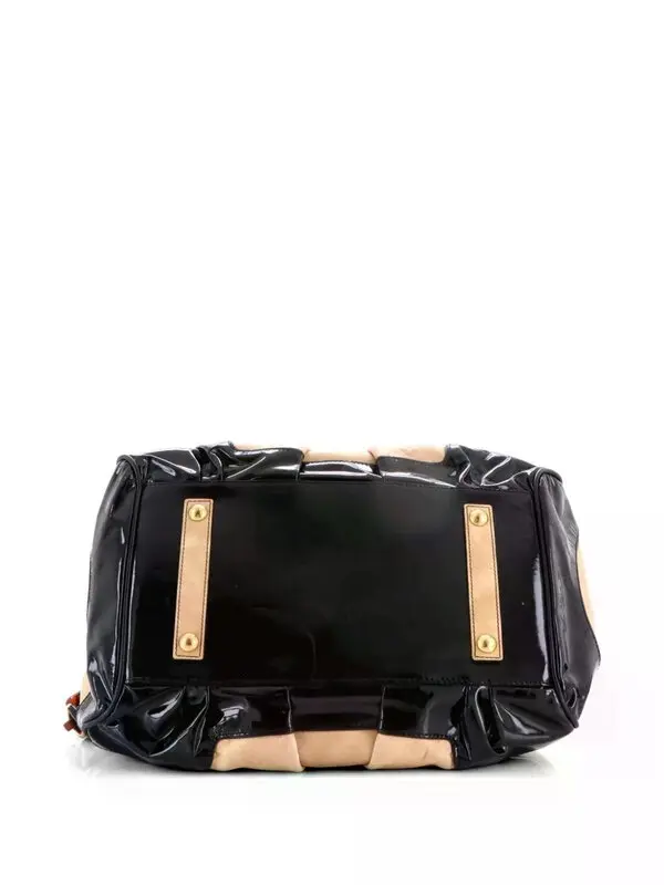 LOUIS VUITTON Stephen Monogram Embossed Leather Satchel