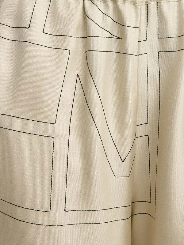 TOTEME Organic Silk Bermuda Shorts With Monogram Embroidery - Cream